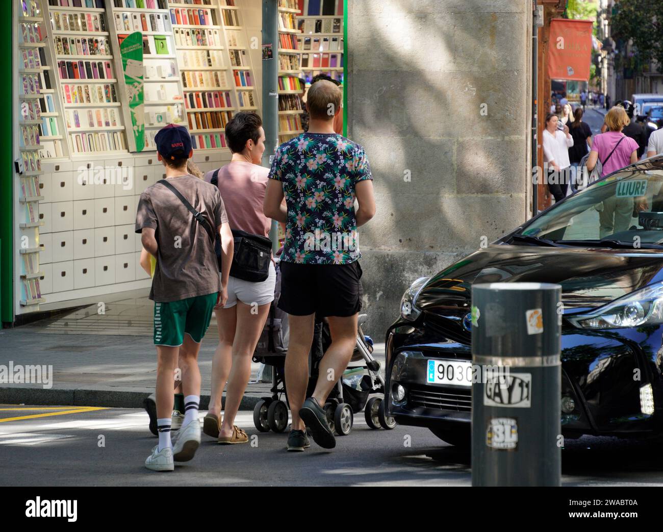 Barcelona, Spain - May 26, 2022: Large family walk together through a ...