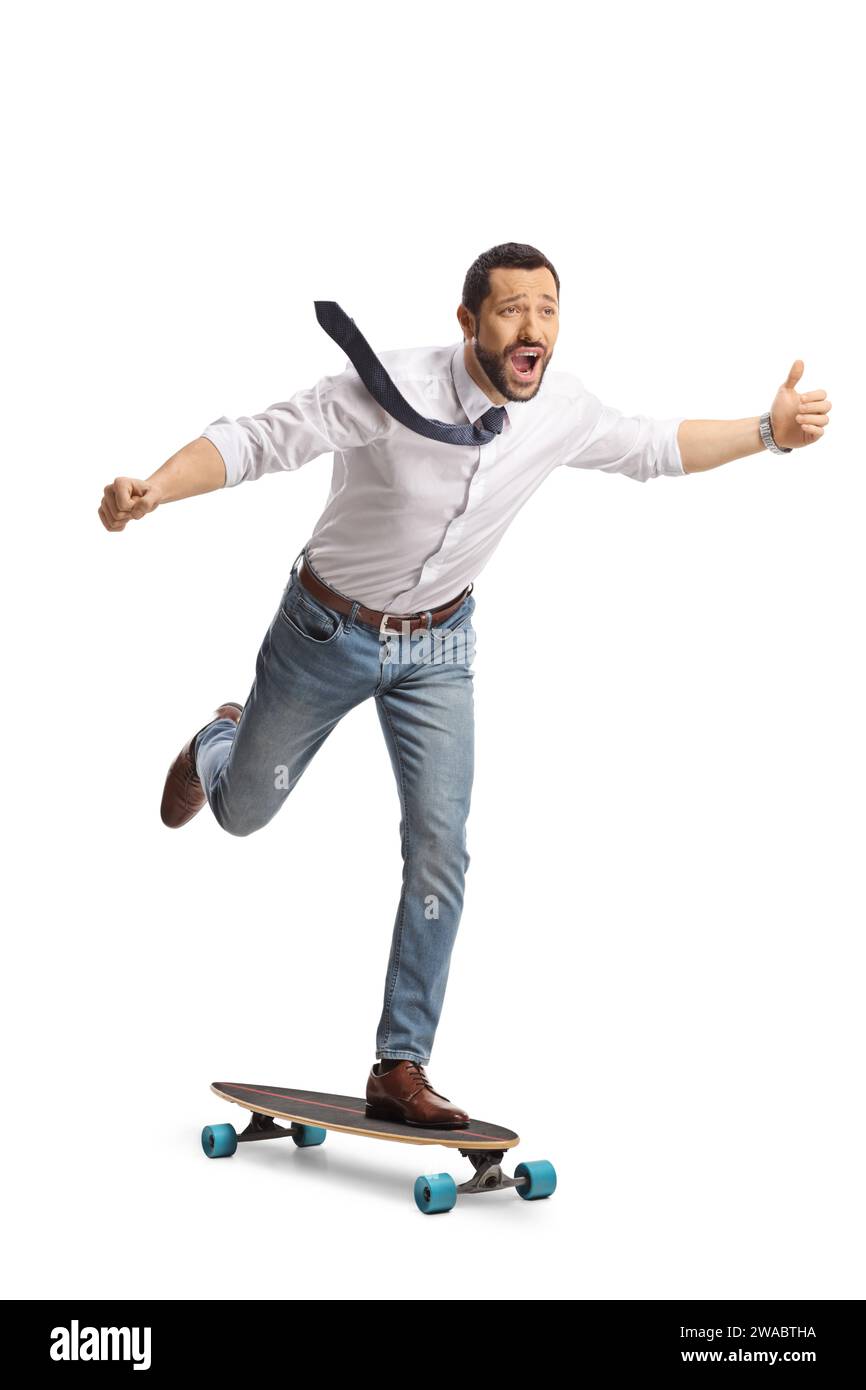 Excited man on a skateboard riding fast isolated on white background ...