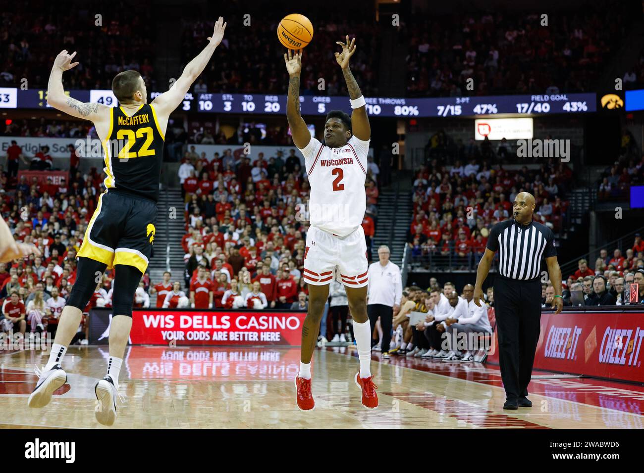 Madison, WI, USA. 2nd Jan, 2024. Wisconsin Badgers guard AJ Storr (2) attempts a 3 point shot ...