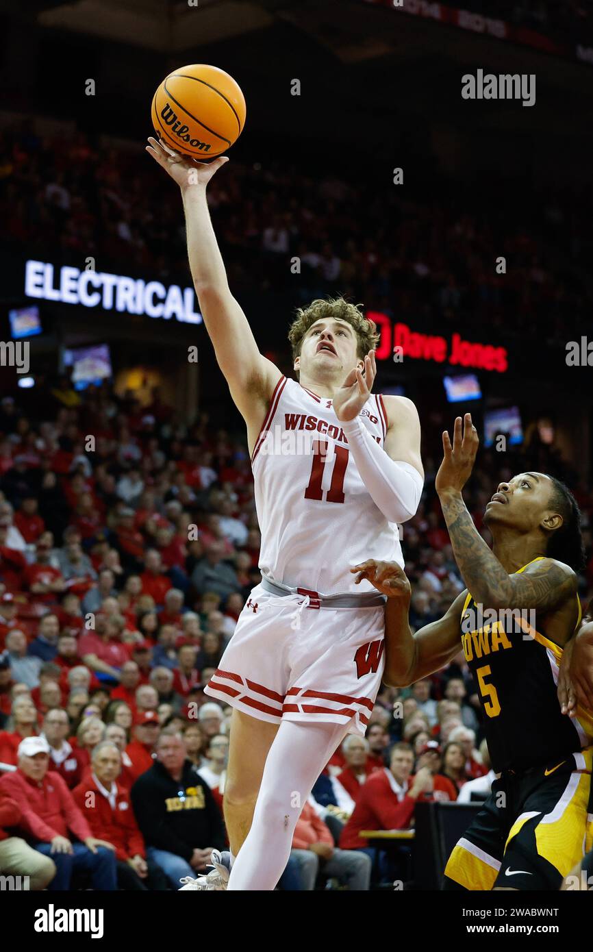 Madison, WI, USA. 2nd Jan, 2024. Wisconsin Badgers guard Max Klesmit ...