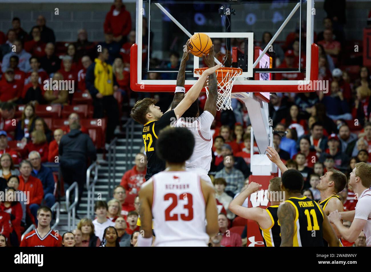 Madison, WI, USA. 2nd Jan, 2024. Wisconsin Badgers guard AJ Storr (2) goes in for a dunk during ...