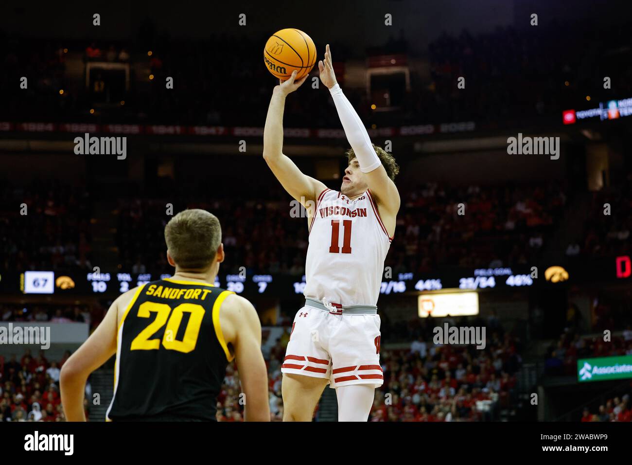 Madison, WI, USA. 2nd Jan, 2024. Wisconsin Badgers guard Max Klesmit ...