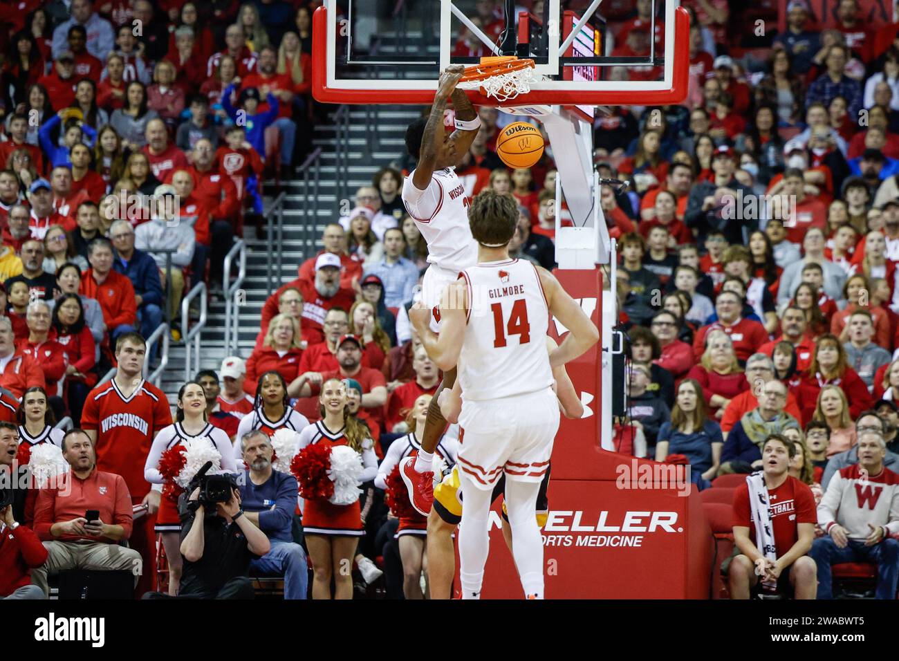 Madison, WI, USA. 2nd Jan, 2024. Wisconsin Badgers guard AJ Storr (2) catches an alley oop and ...
