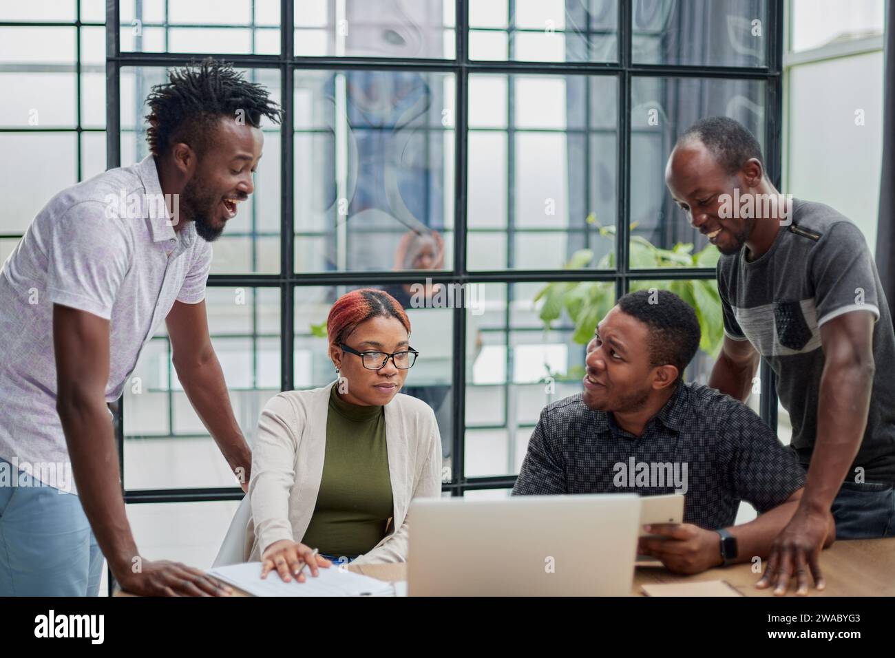 College friends collaborating on project hi-res stock photography and ...