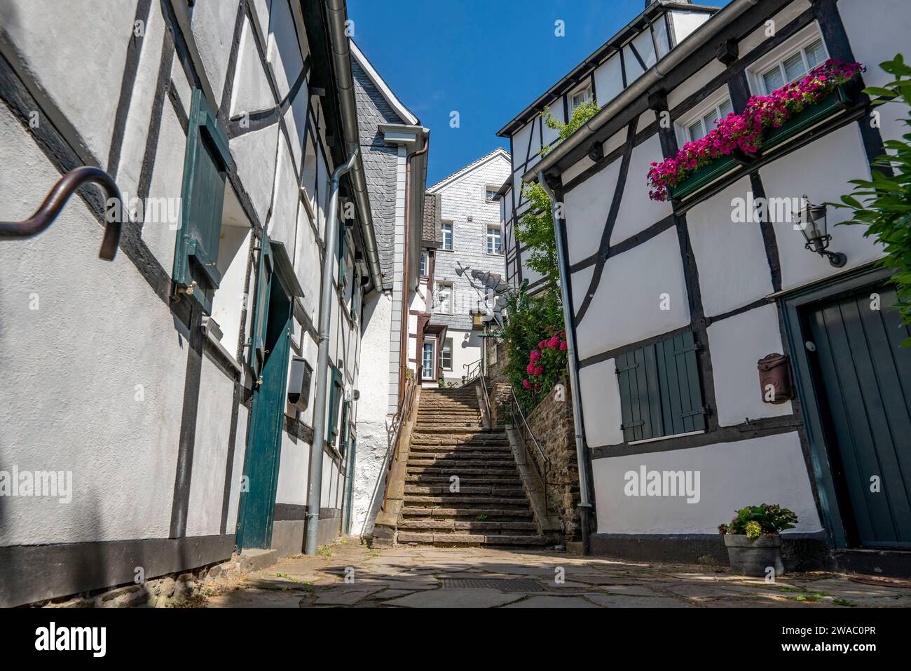 The old town centre of Essen-Kettwig, Ruhrstrasse, church steps, night ...