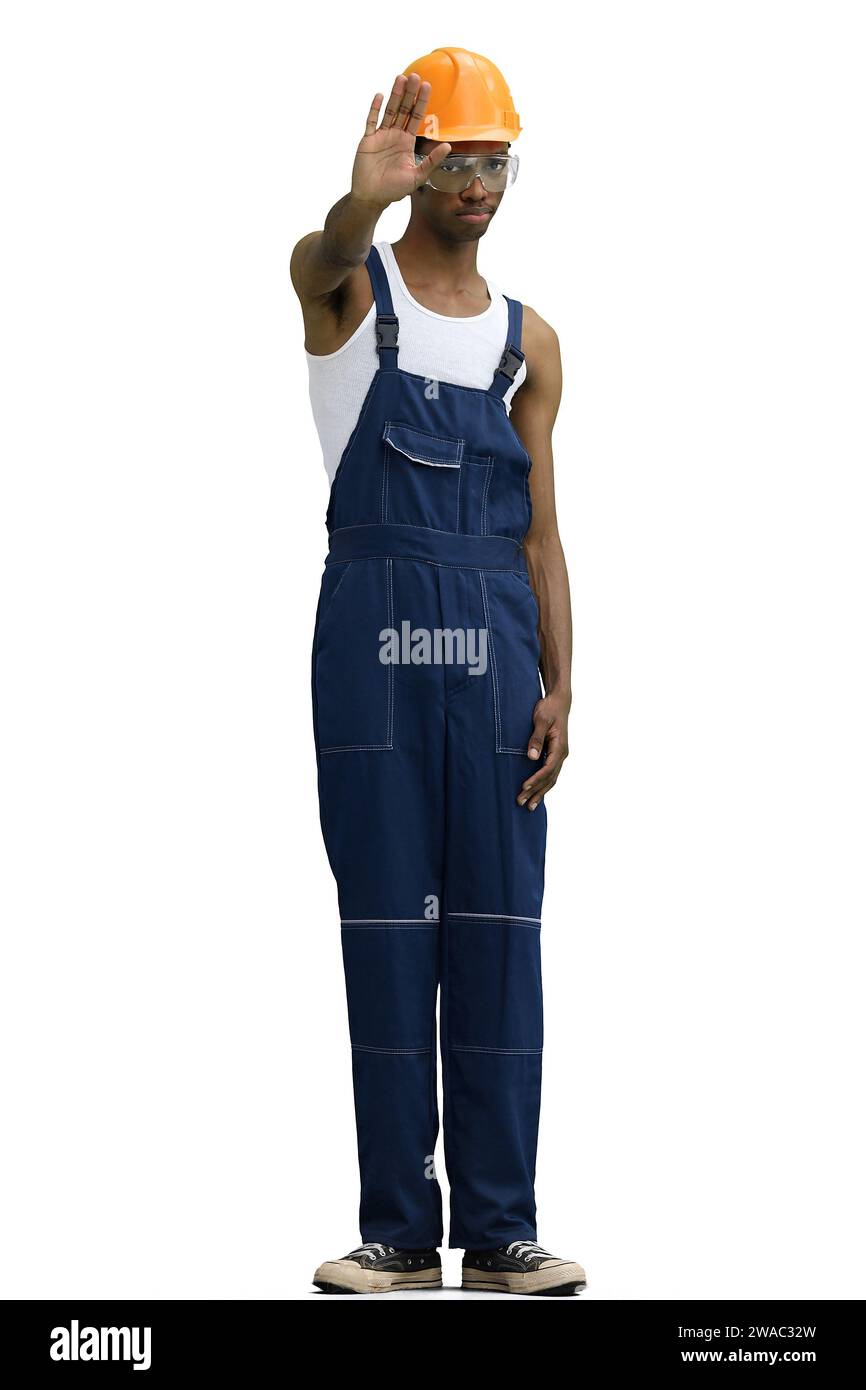 A male construction worker, on a white background, in full height ...