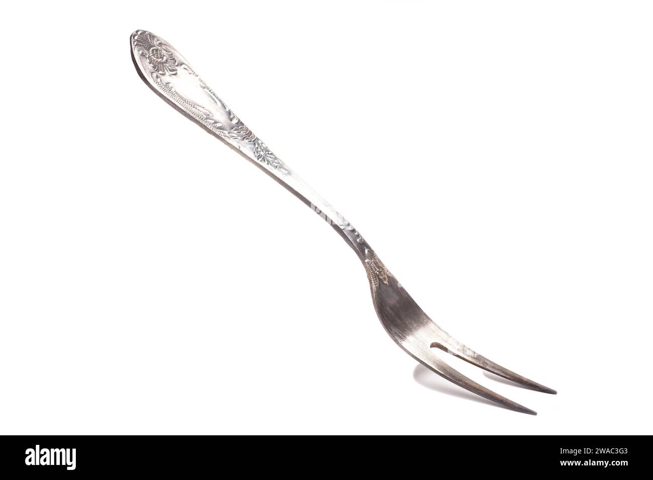 Old Silver Serving Fork isolated on white background Stock Photo - Alamy