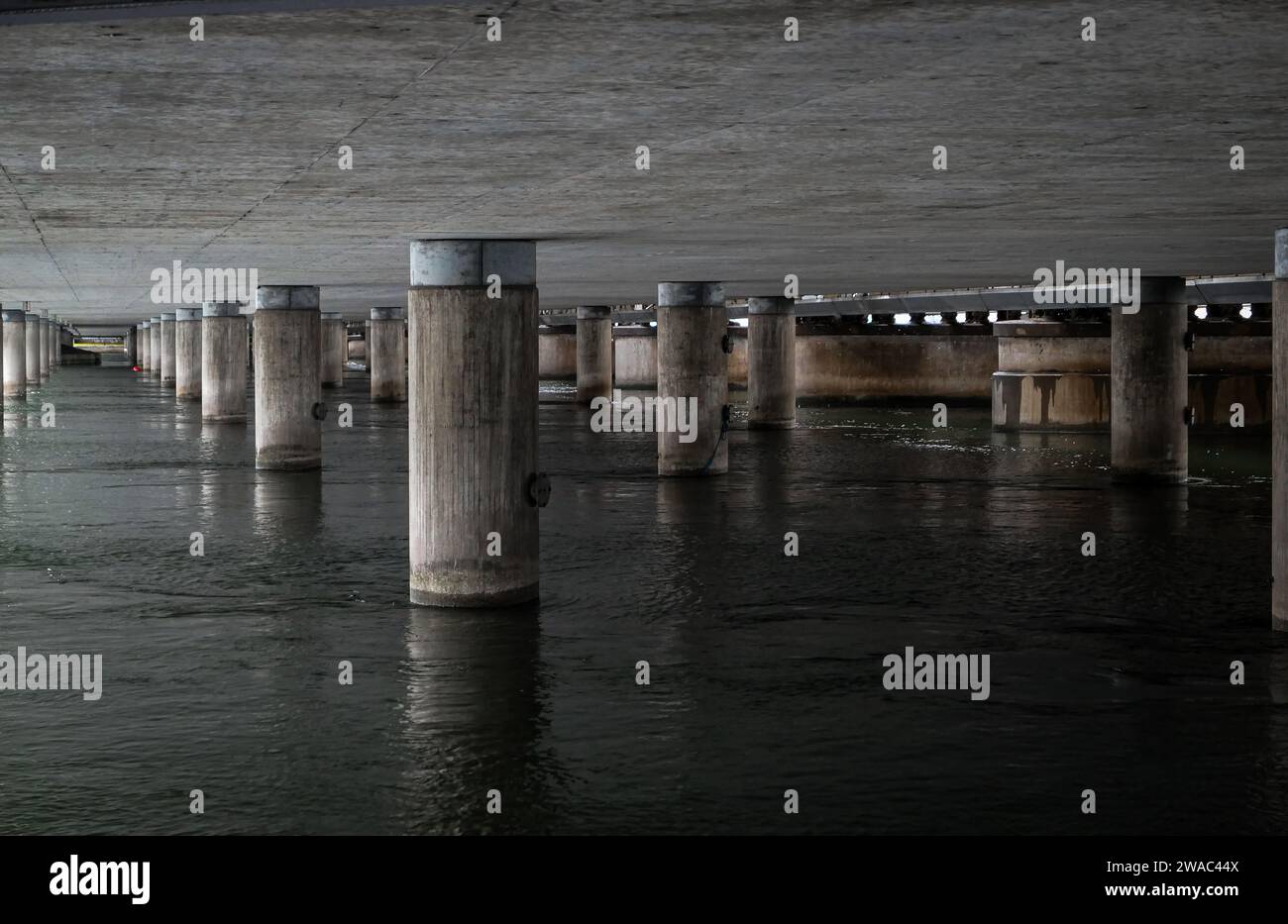 View of water under a bridge Stock Photo - Alamy
