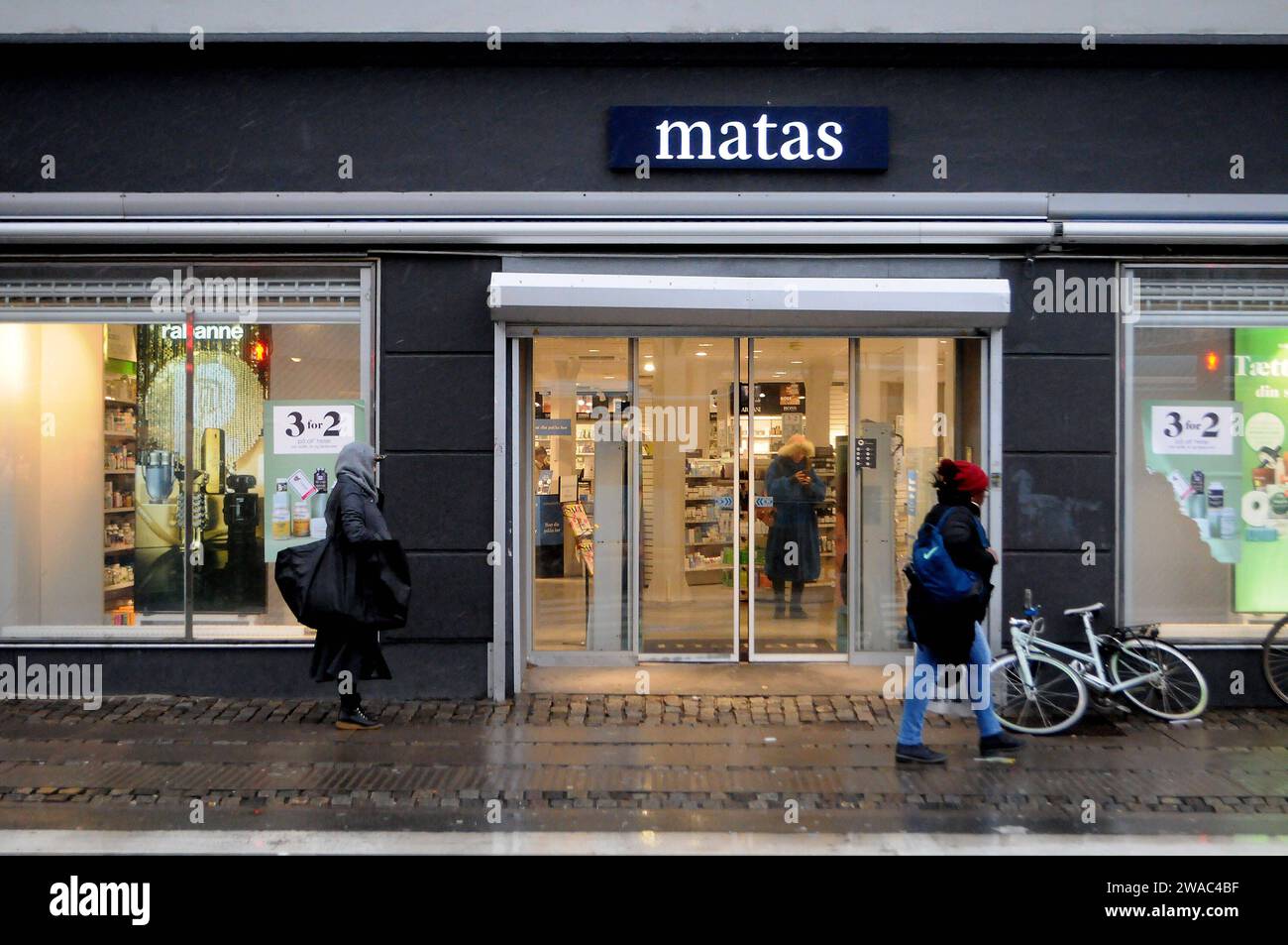 Copenhagen, Denmark /03 January 2024/. people walk by Matas store in ...