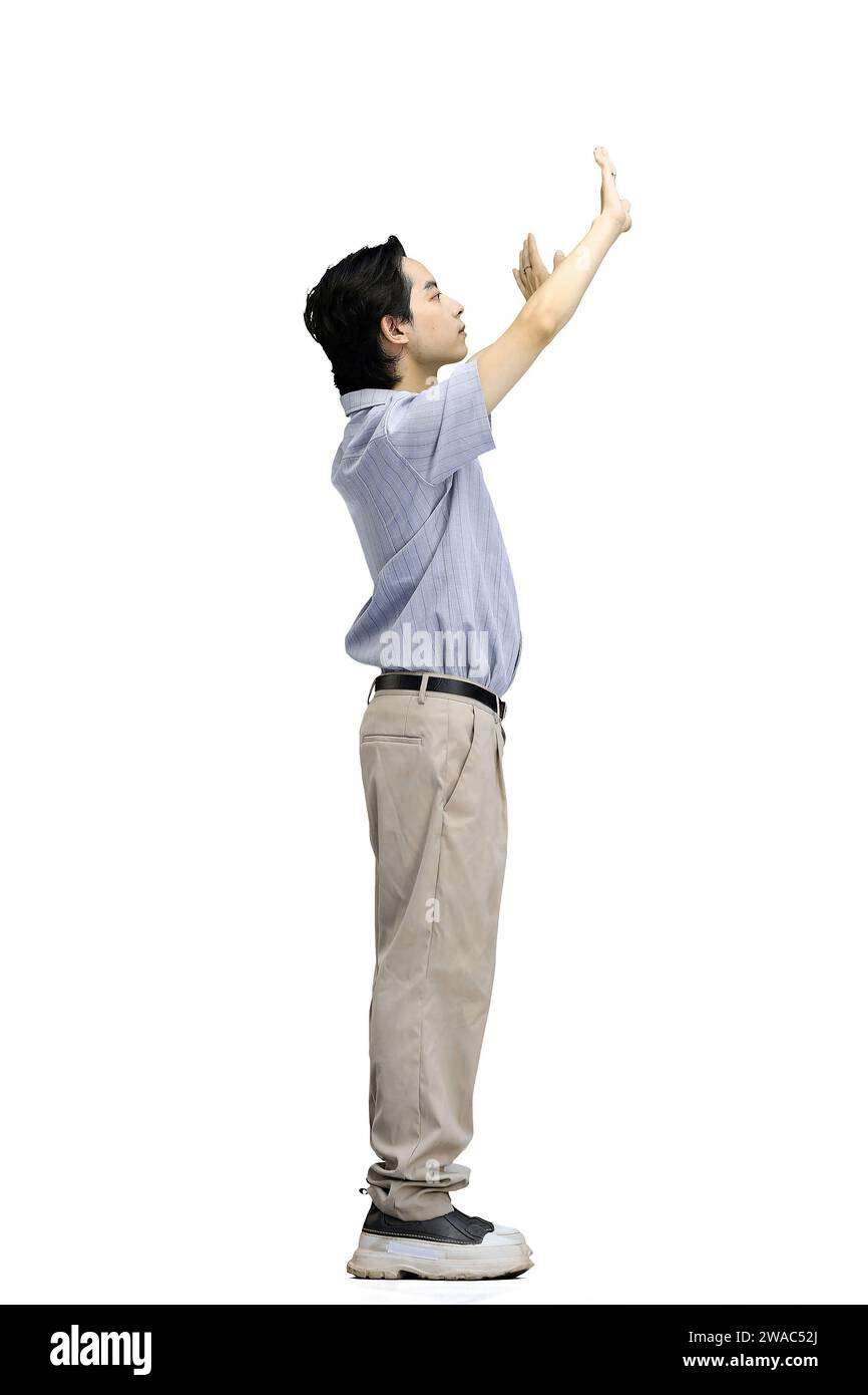 A guy in a blue shirt, on a white background, in full height, waving ...
