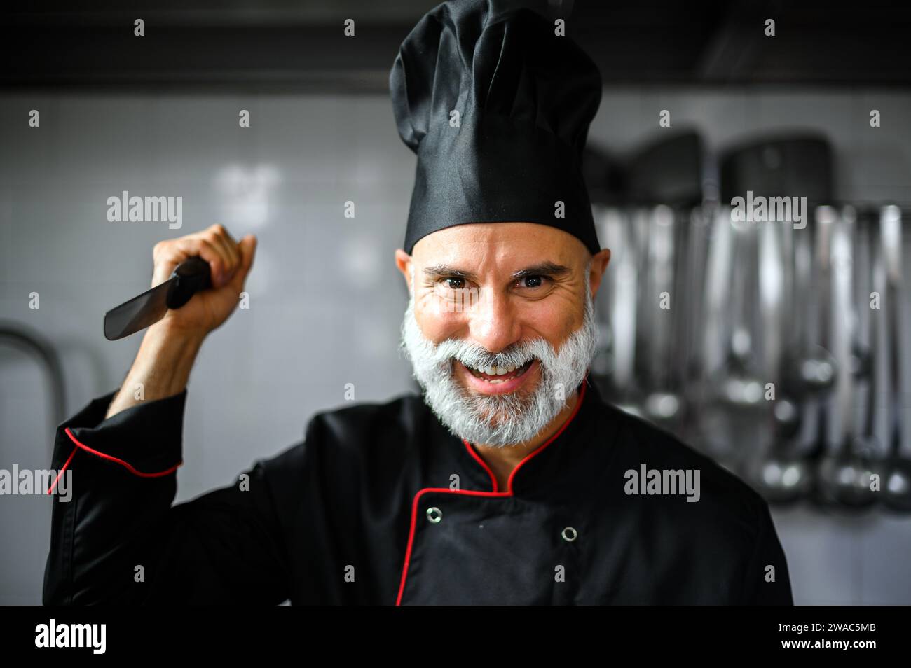 Bearded chef knife serious hi-res stock photography and images - Alamy