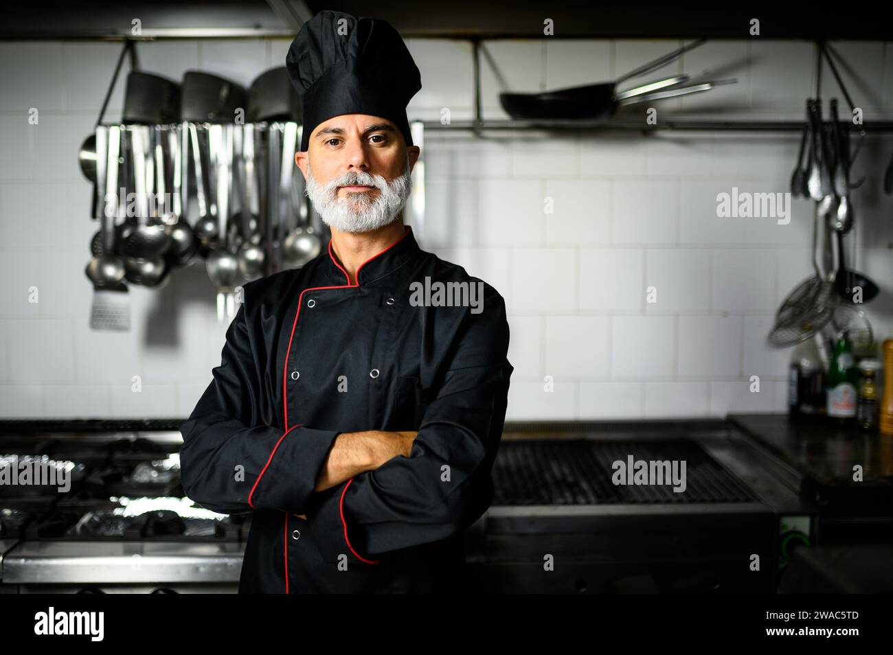 Mature black man cooking kitchen hi-res stock photography and images ...