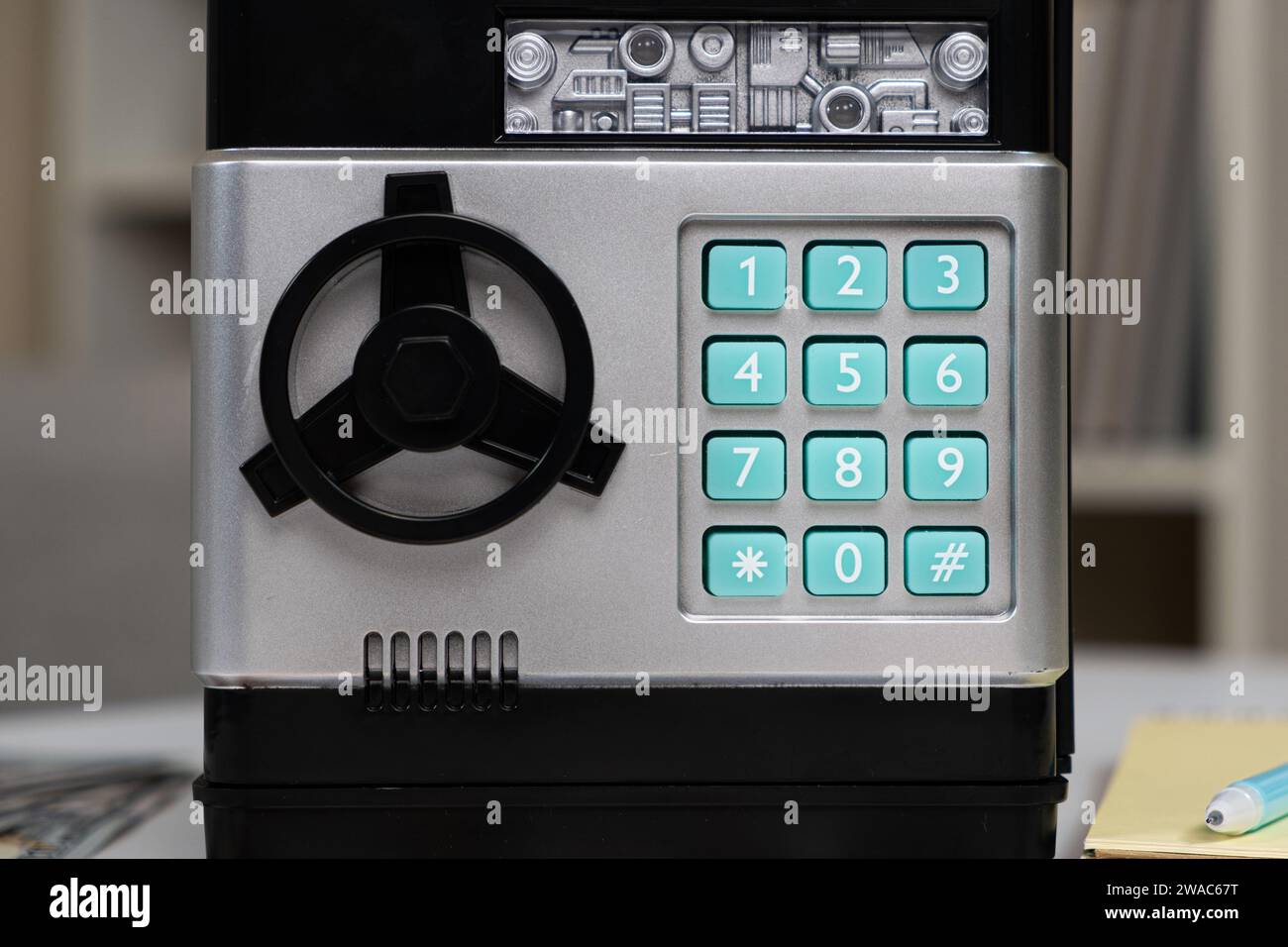 Toy safe piggy bank for money, coins and banknotes for kids Stock Photo ...