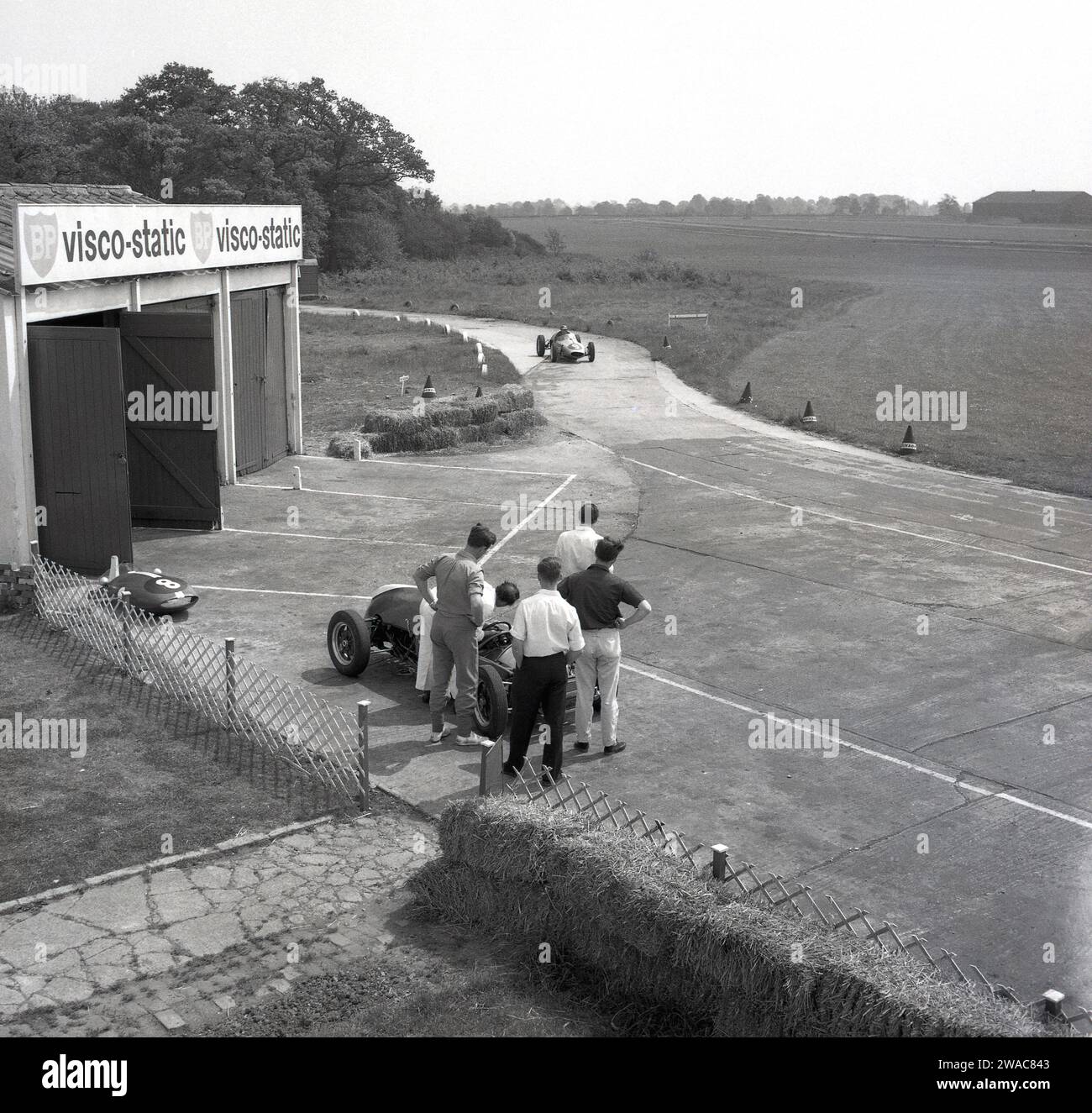 1962, historical, overhead view of activity at Geoff Clarke's motor ...