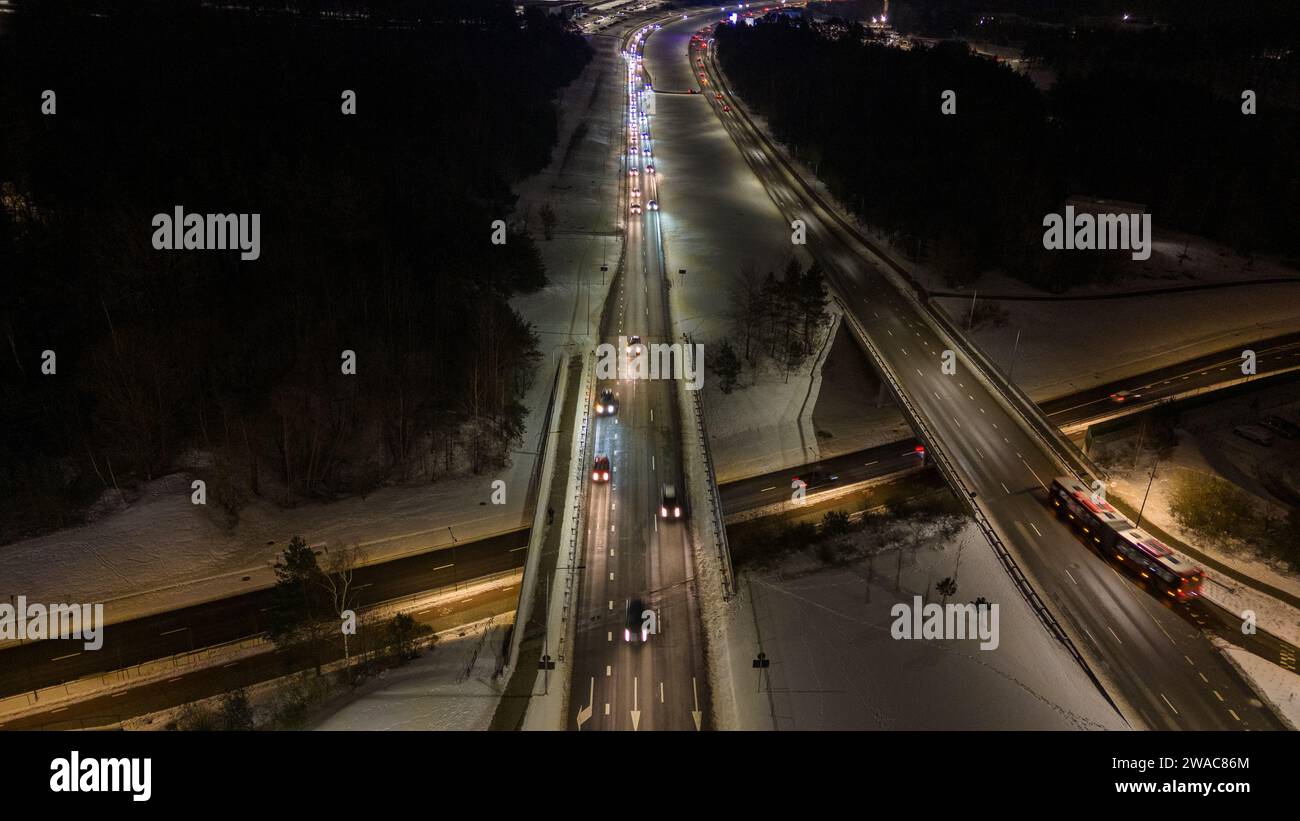 Drone photography of high intensity roadway during winter night with ...