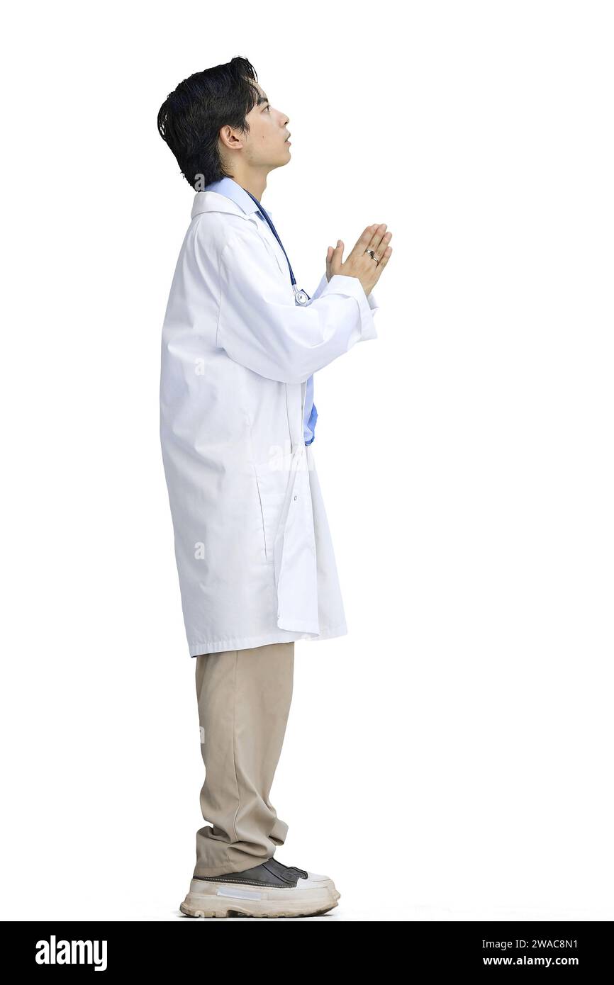 The guy is a doctor, on a white background, full-length, begging Stock ...