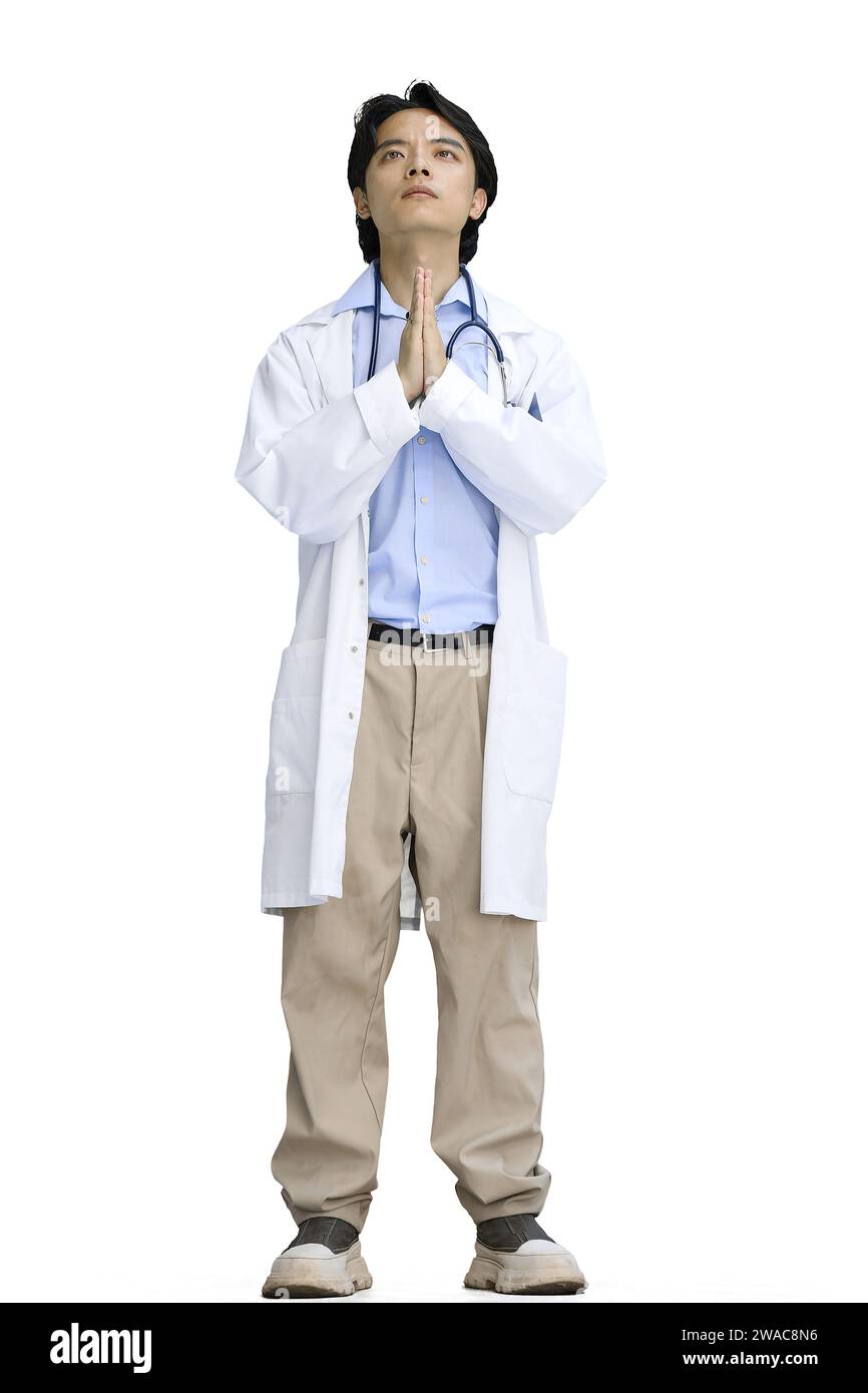 The guy is a doctor, on a white background, full-length, begging Stock ...