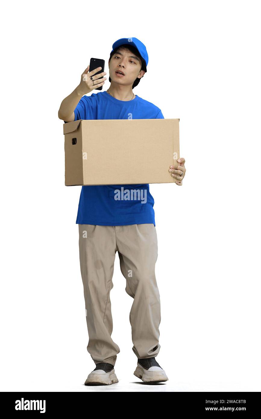 The delivery guy, on a white background, full-length, with a box and a ...