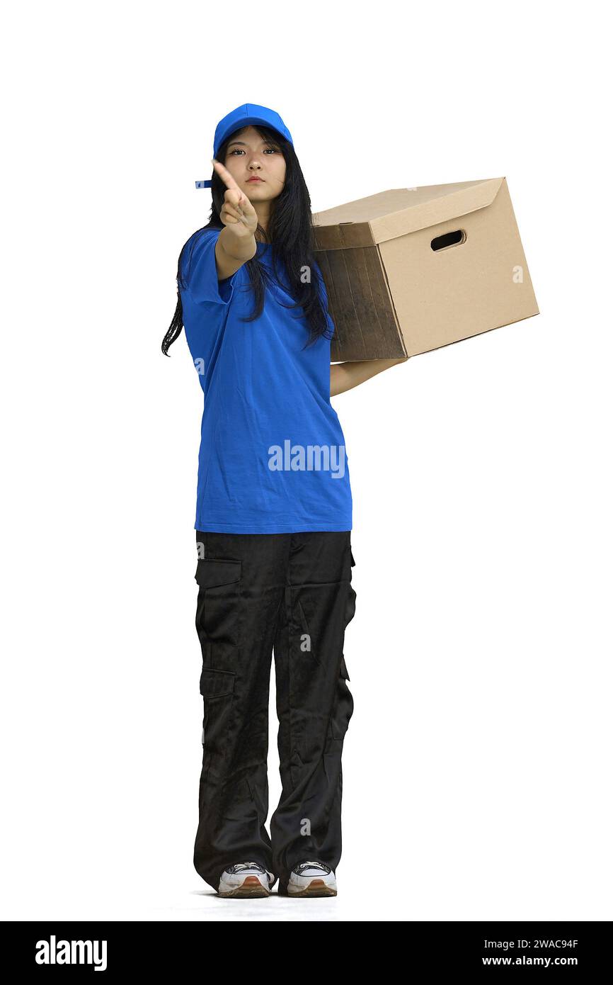 A delivery girl, on a white background, full-length, with a box, shows ...