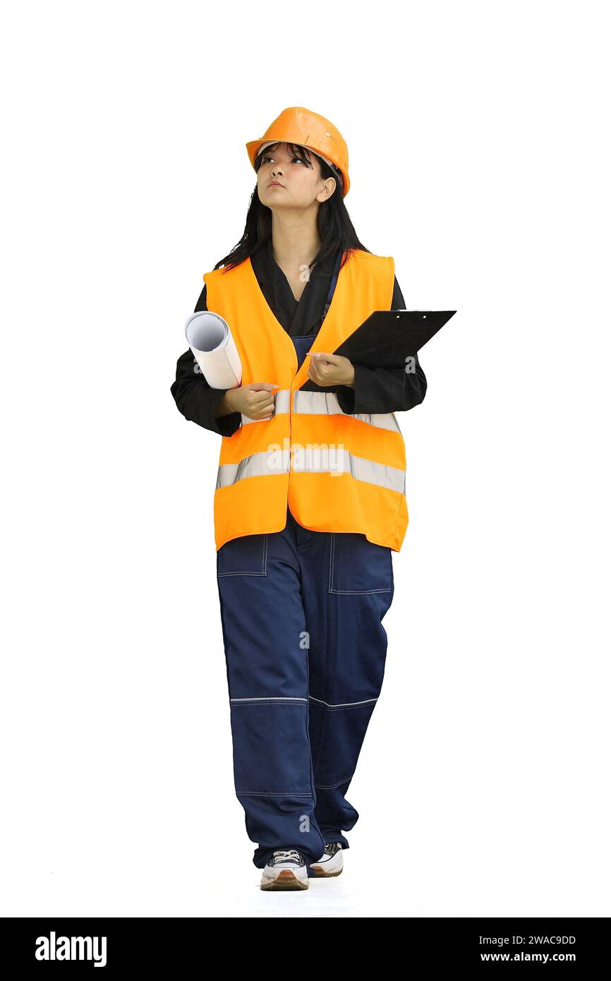 A construction girl on a green background, full-length, with drawings ...