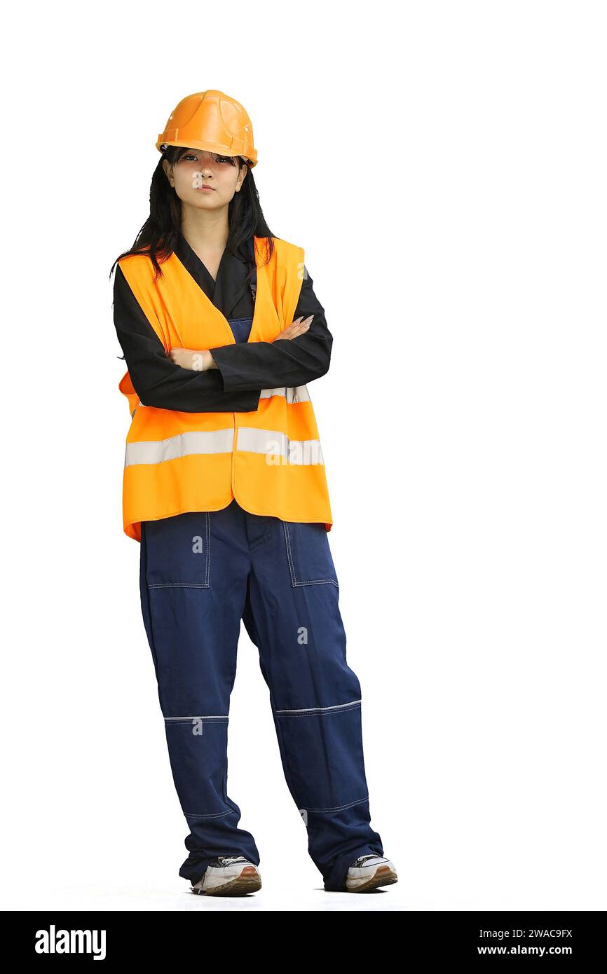 A construction worker on a green background, full-length, she crossed her arms Stock Photo - Alamy