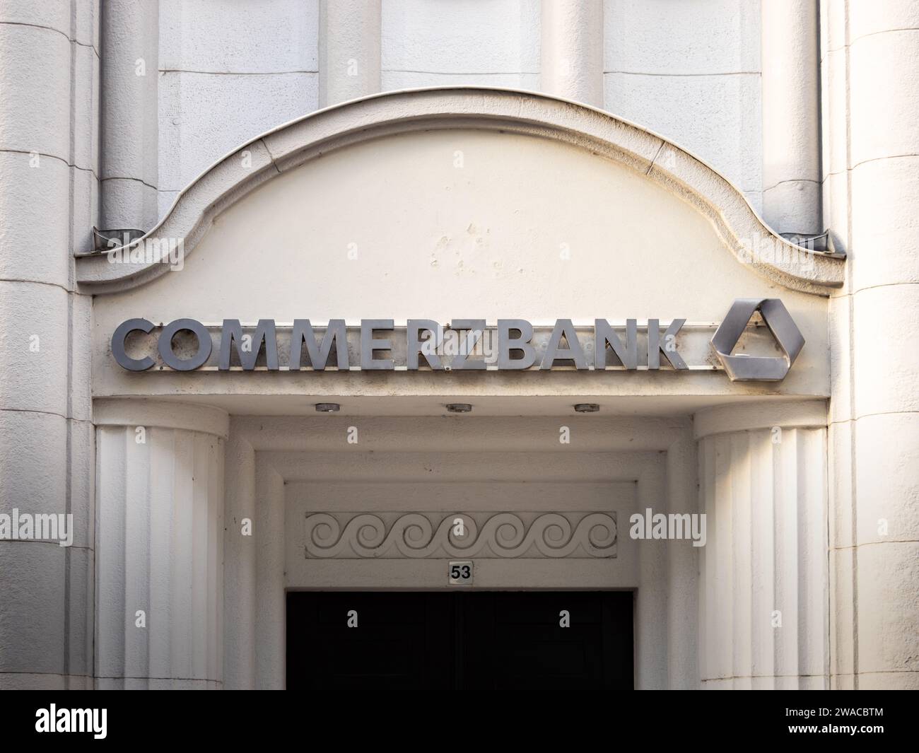 Commerzbank logo sign above the entrance of the building. Branch of the ...