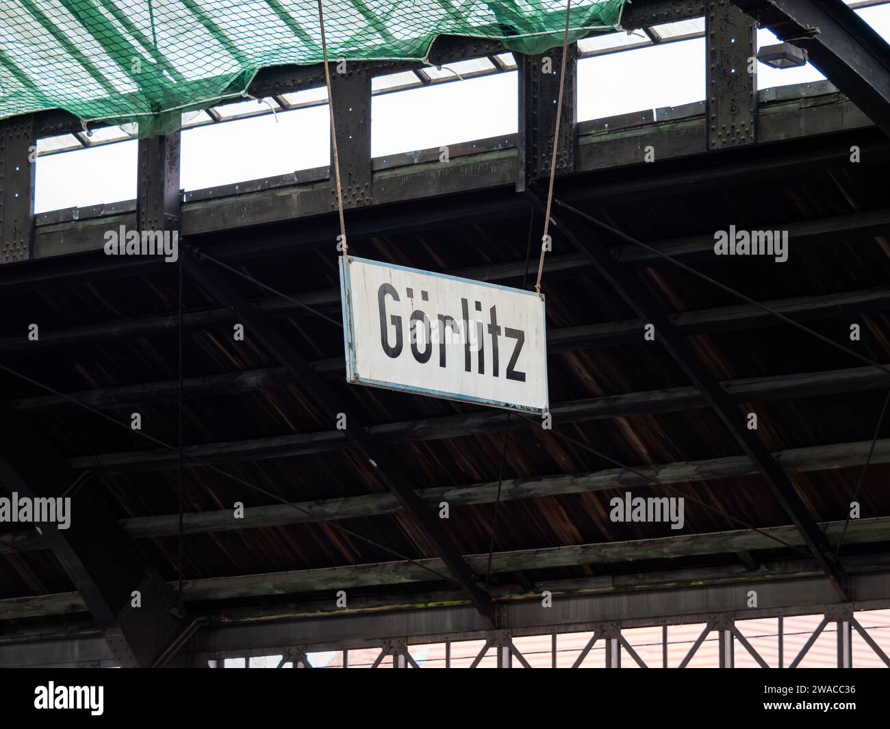 Görlitz location sign hanging from the ceiling in an old building ...