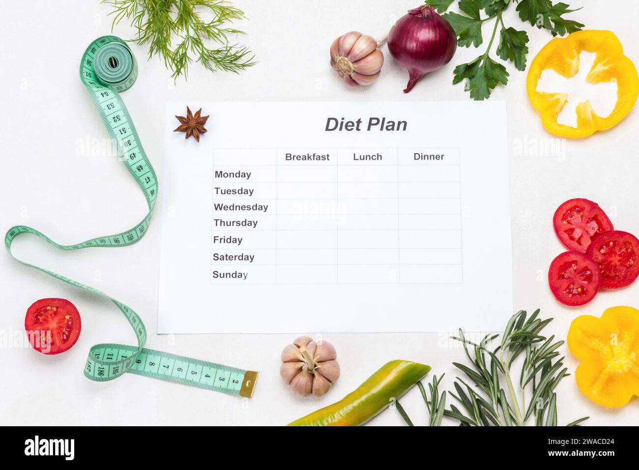 Diet food. Sheet of paper with diet plan for week. Pen and measuring ...