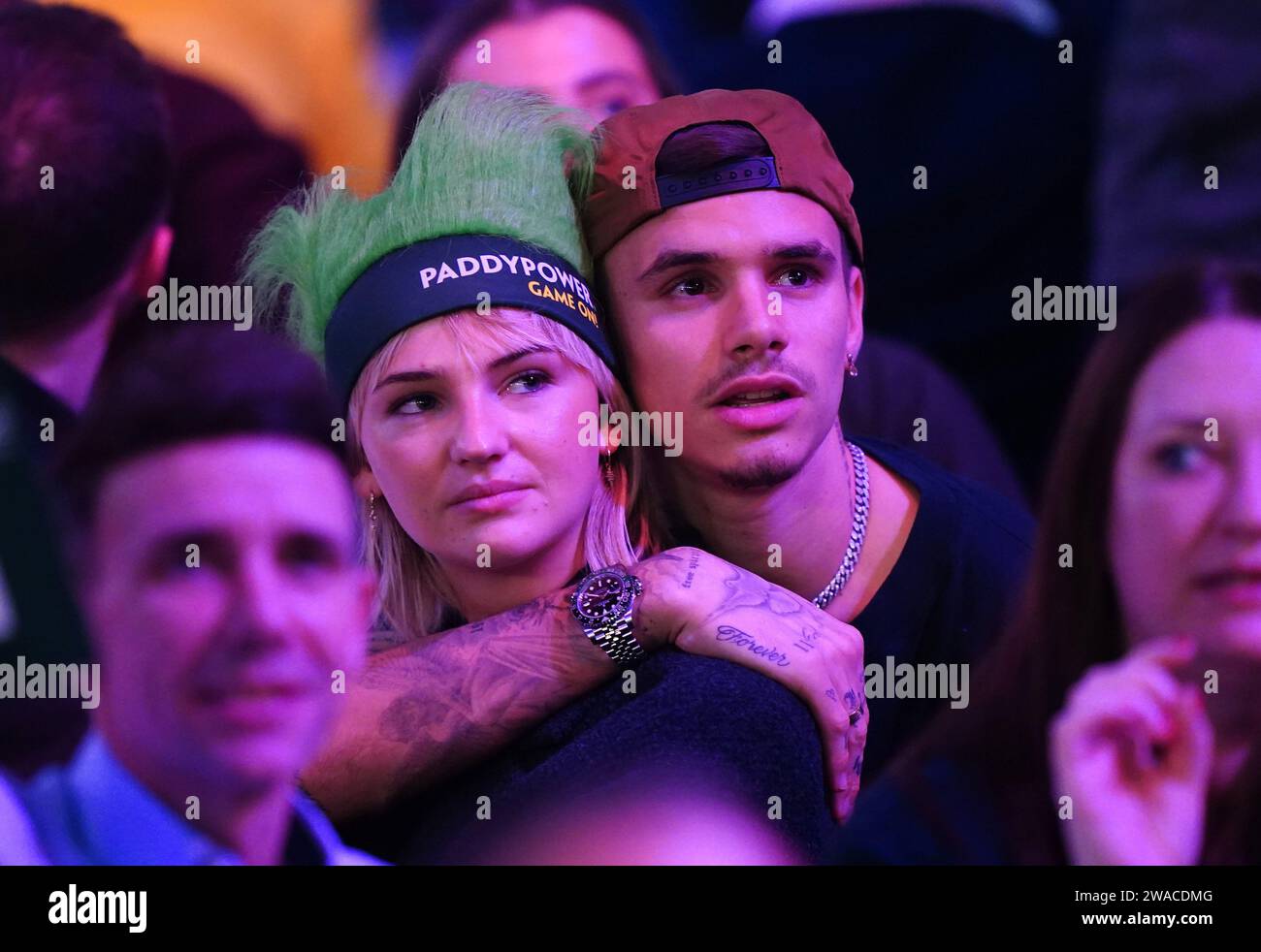 Romeo Beckham looks on during the final of the Paddy Power World Darts ...