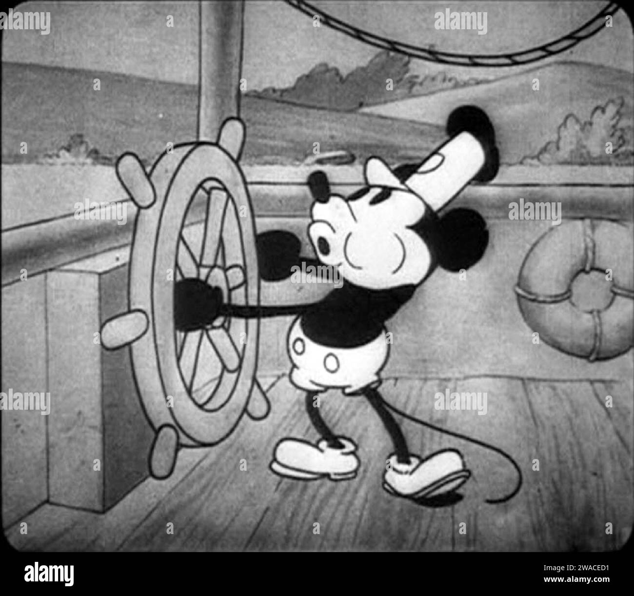 A still frame from the 1928 Mickey Mouse cartoon, Steamboat Willie Stock Photo - Alamy