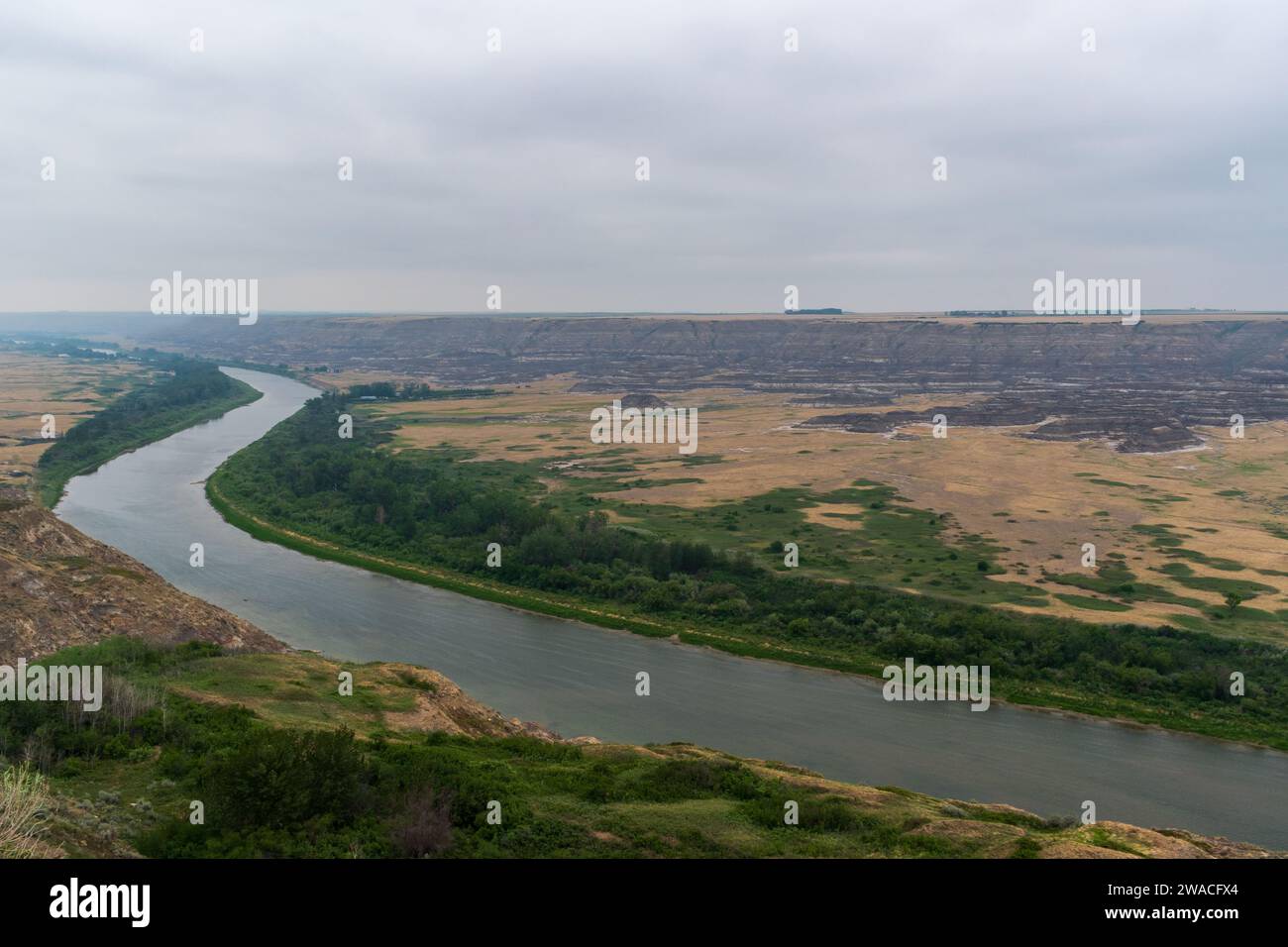 River flows through the Alberta Badlands, Drumheller, Alberta Stock ...