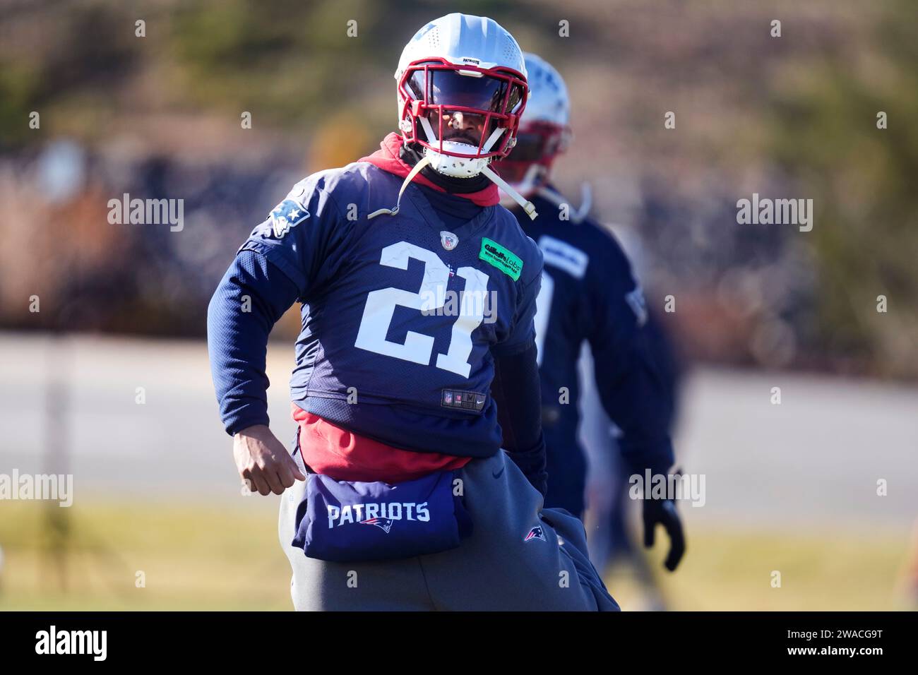 New England Patriots safety Adrian Phillips (21) stretches during an ...