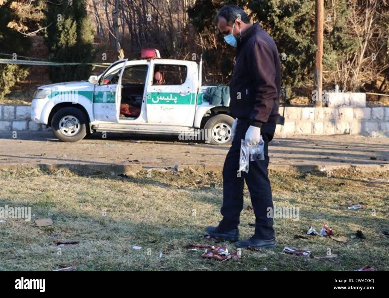 Kerman, Iran. 3rd Jan, 2024. Police at the scene after explosions at a ...