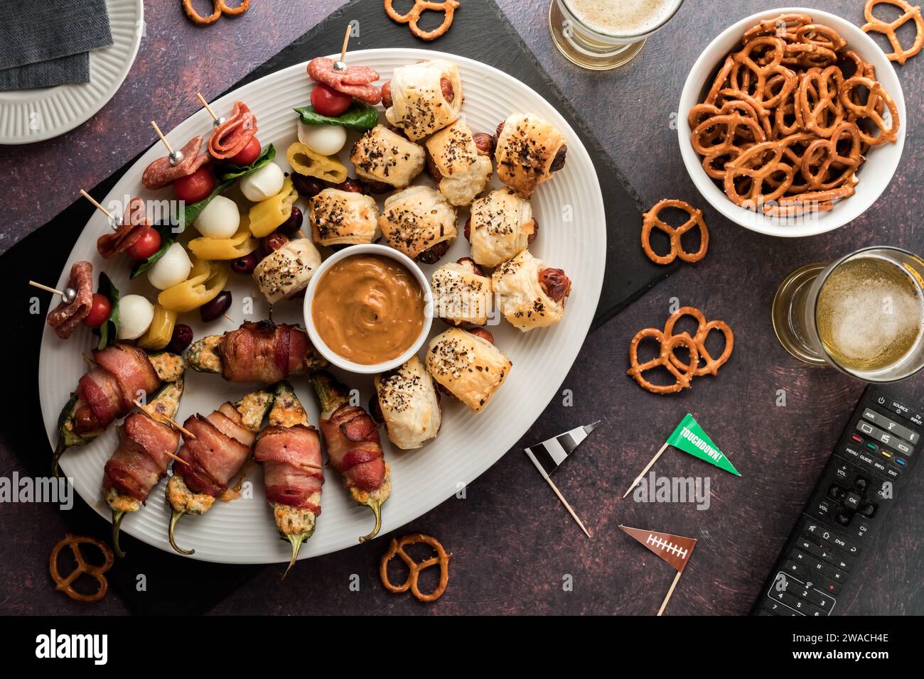 A platter of game day appetizers with beer and pretzels Stock Photo - Alamy