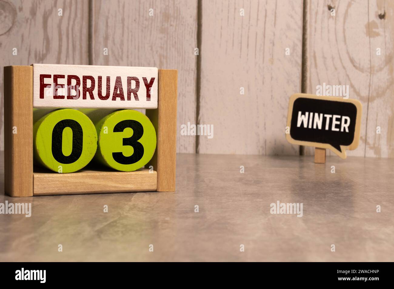 Flower pot and calendar for the snow season from 03 February. Winter ...