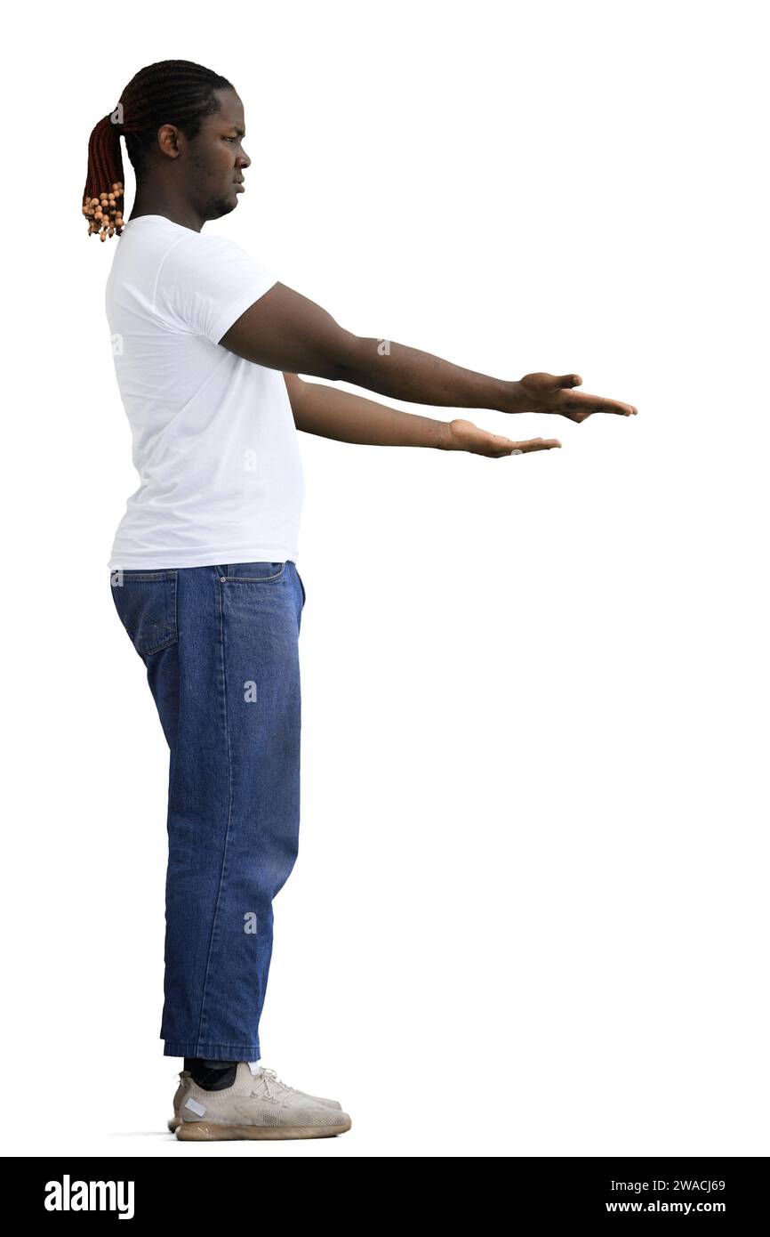 A man in a white T-shirt on a White background put his arms forward, in ...