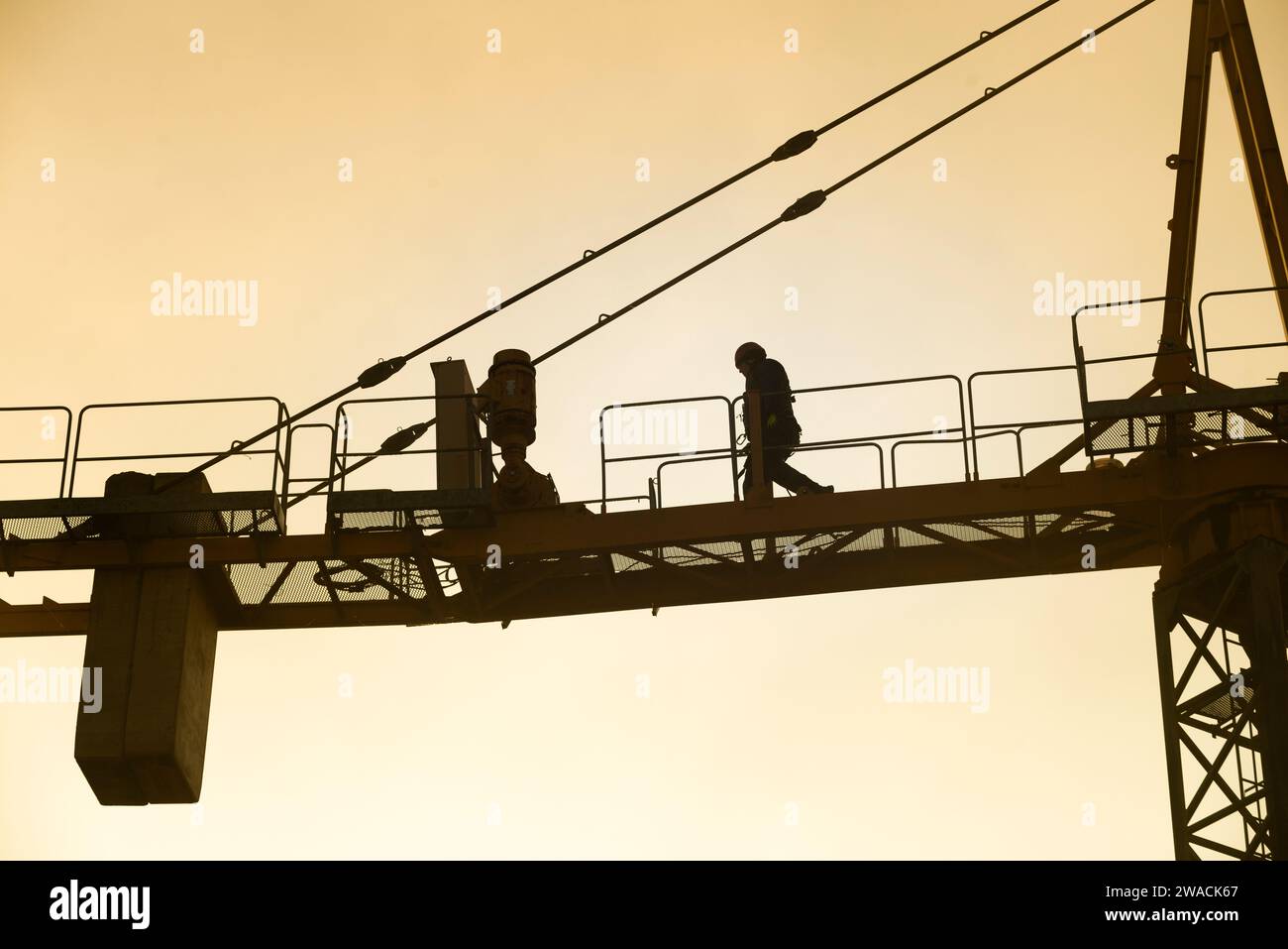 Workers Removing a Tower Crane Stock Photo - Alamy