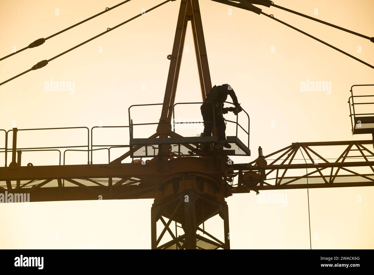 Workers Removing a Tower Crane Stock Photo - Alamy