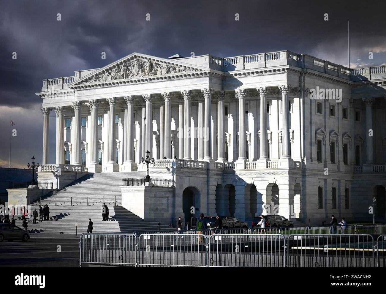 Neoclassical style, the US Capitol Building with stormy skies houses ...