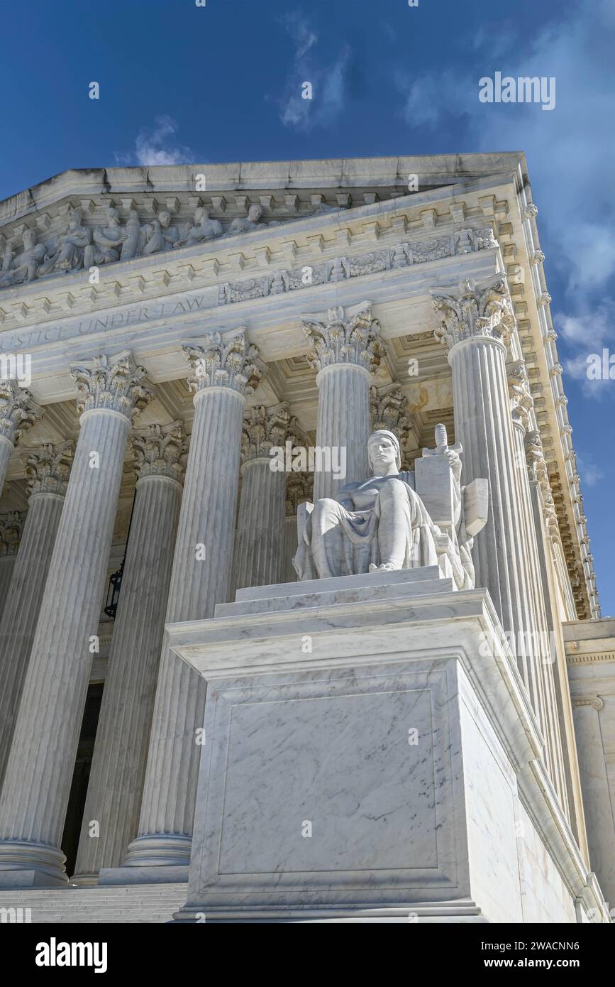 A dramatic close up of the seated marble statue "Guardian" in ...