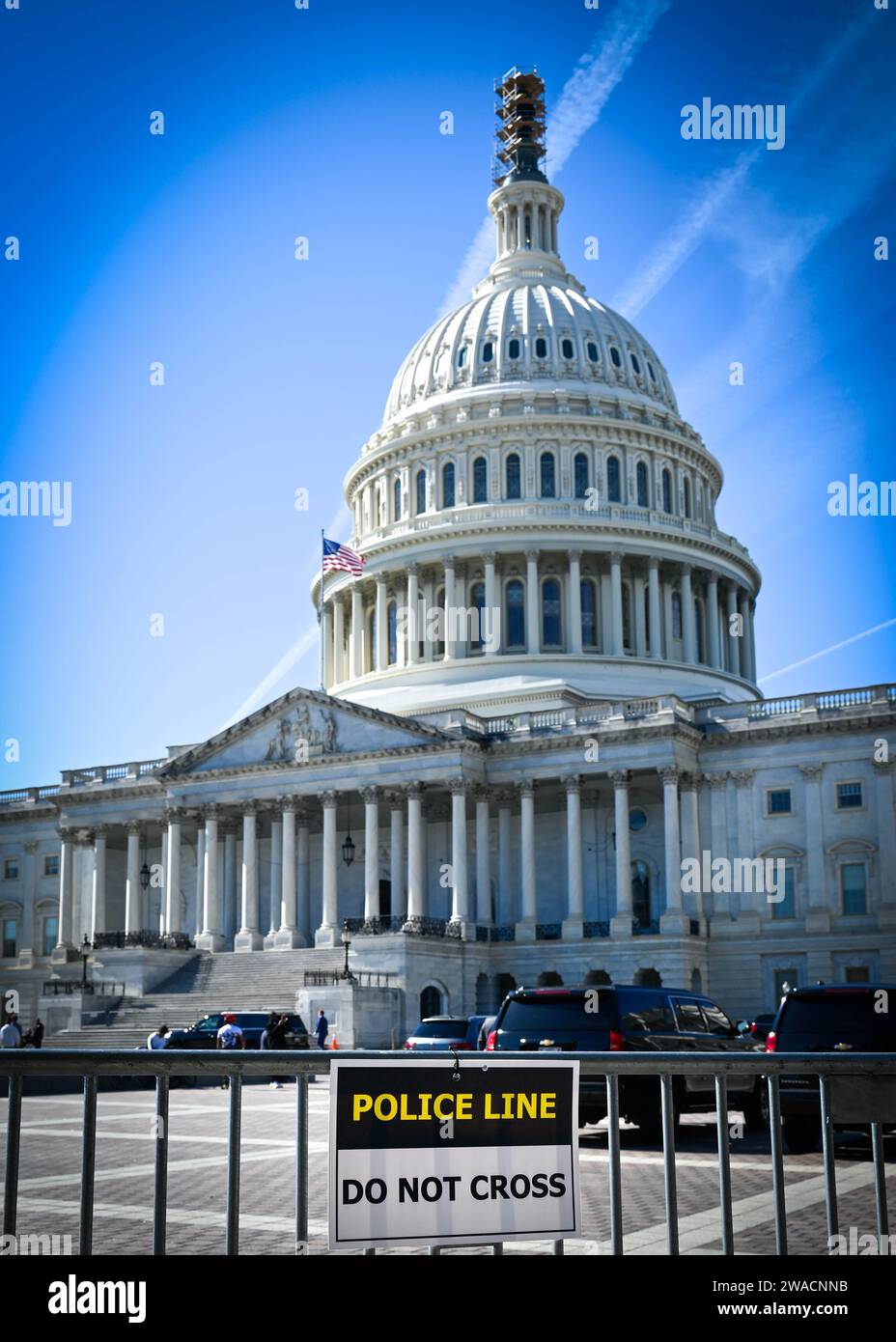 Police Line Do Not Cross sign on barrier gate in front of the US ...