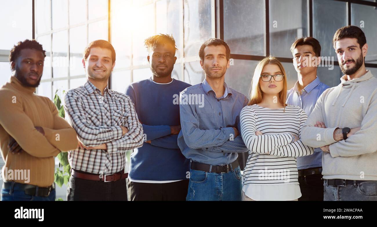 a group of business people of six people standing in the office Stock ...