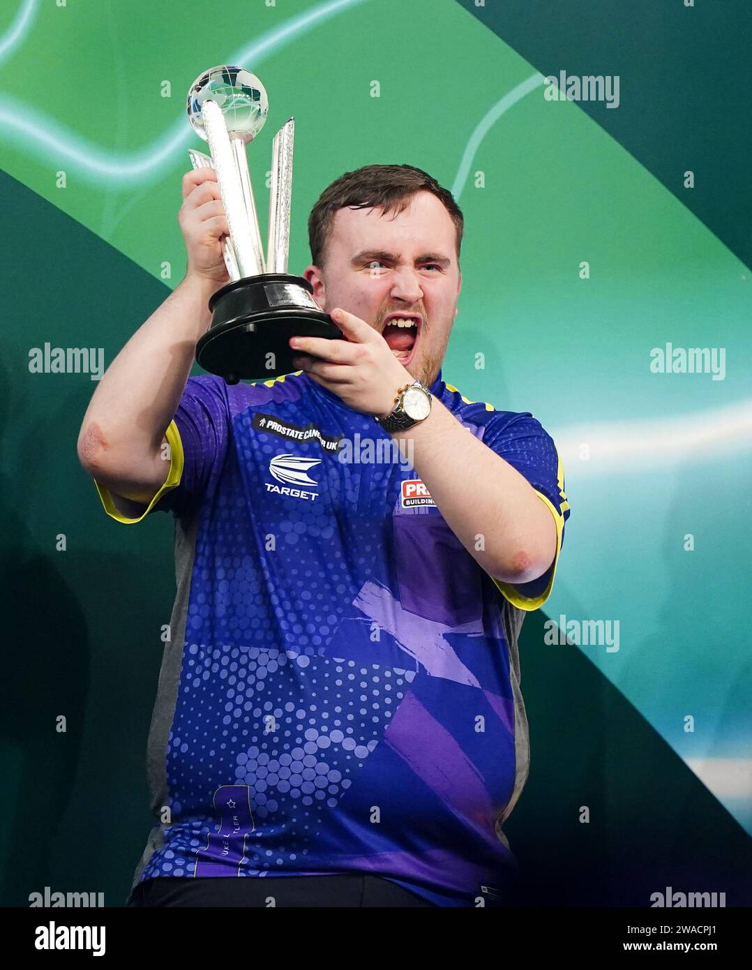 Luke Littler celebrates with his runners up trophy after being beaten ...