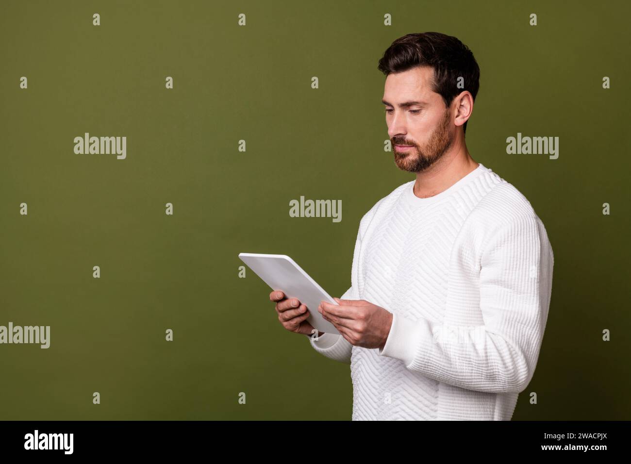 Photo of successful nice man reading email letter booking site website ...