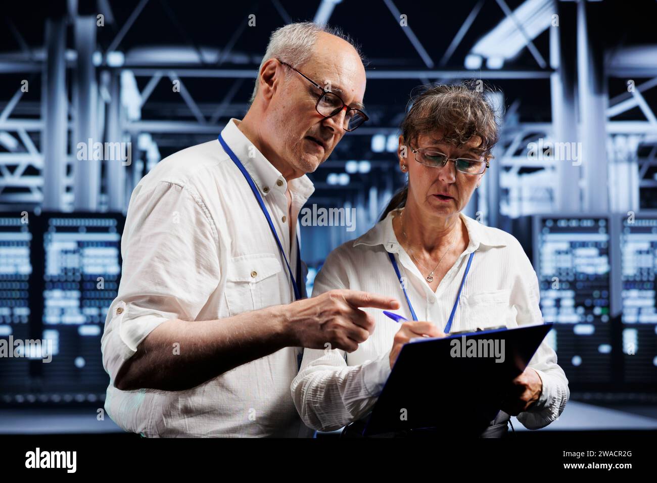 Technical support consultants fixing server system failures. Old ... Technical support consultants fixing server system failures. Old ...