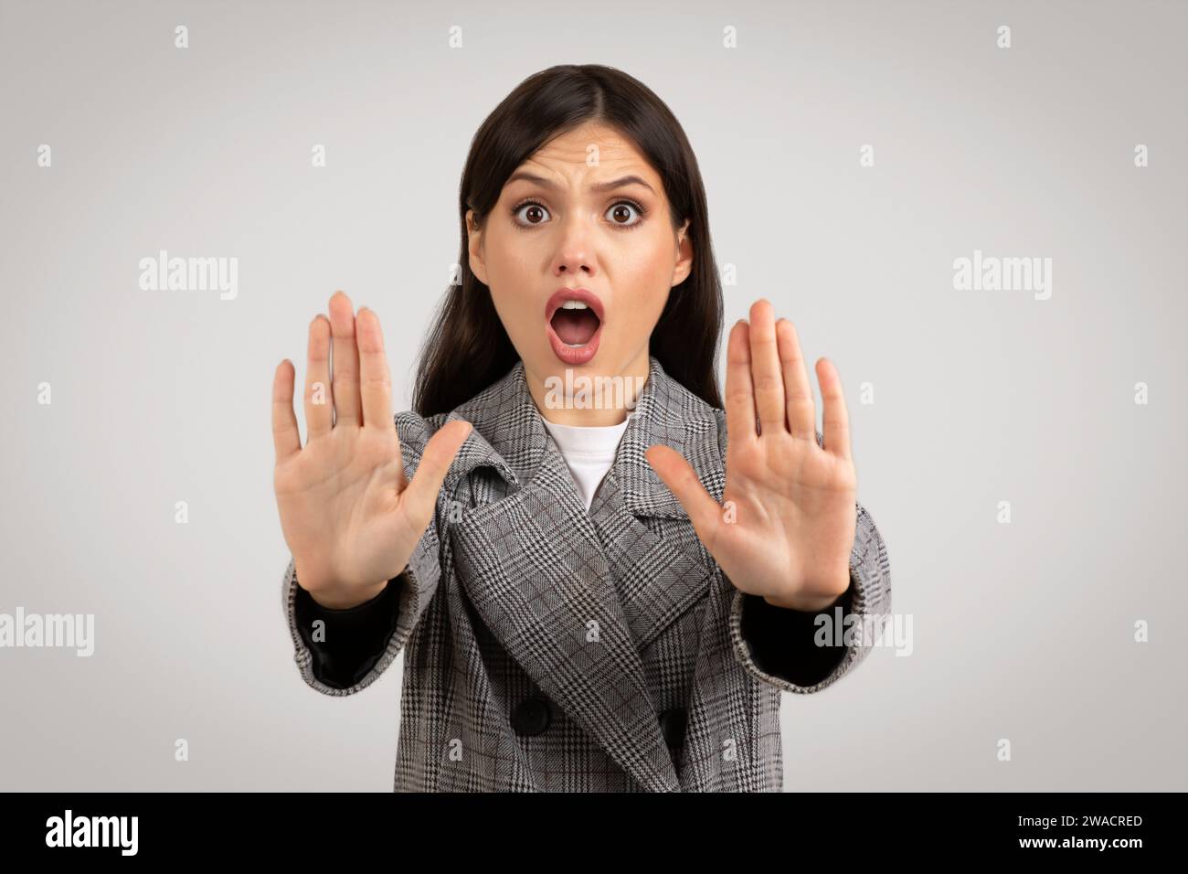 Shocked woman face raised hands hi-res stock photography and images - Alamy