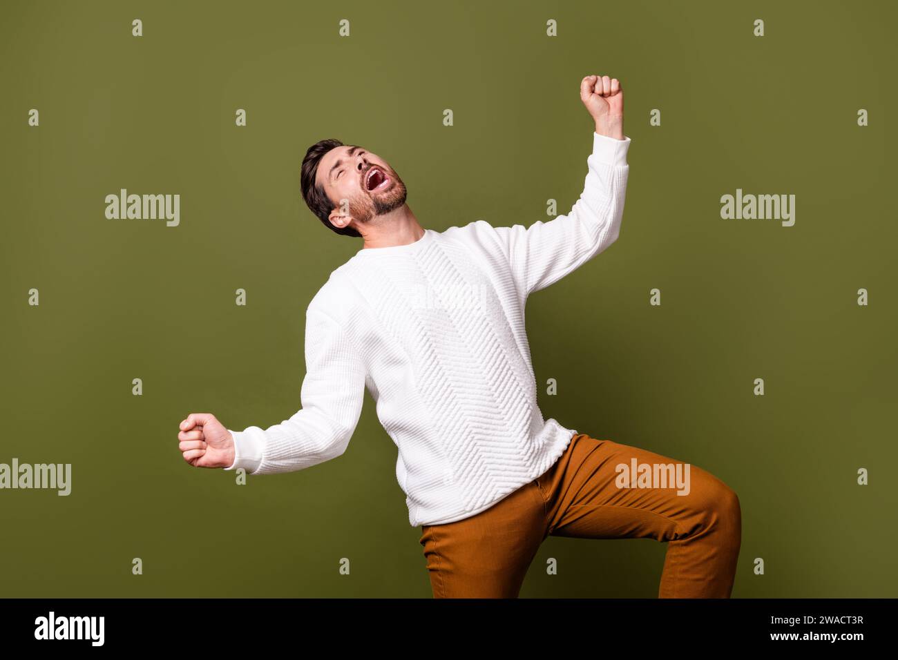 Photo of good mood positive man wearing white trendy clothes shouting ...