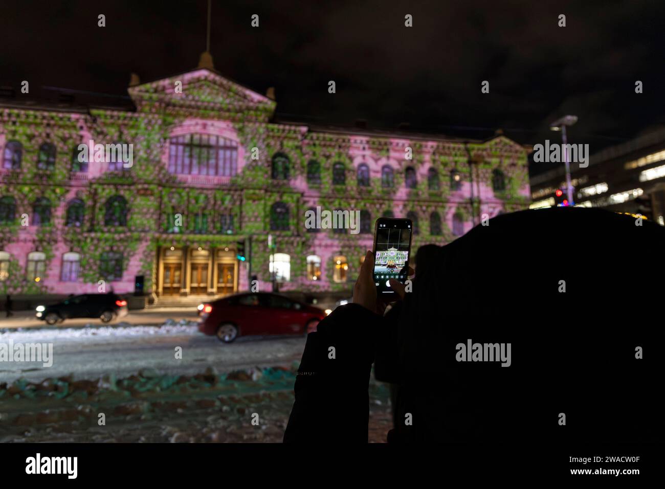 Helsinki, Finland. 3rd Jan, 2024. A person takes photos of the ...