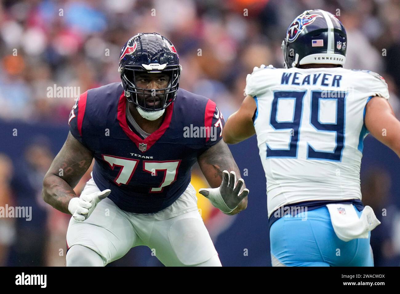 Houston Texans offensive tackle George Fant (77) defends against ...