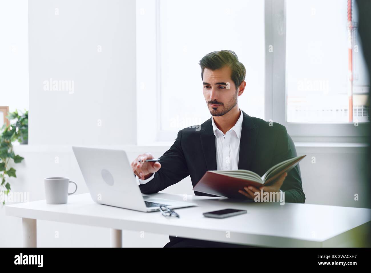 Glasses man working sitting office laptop tired thinking stressed ...